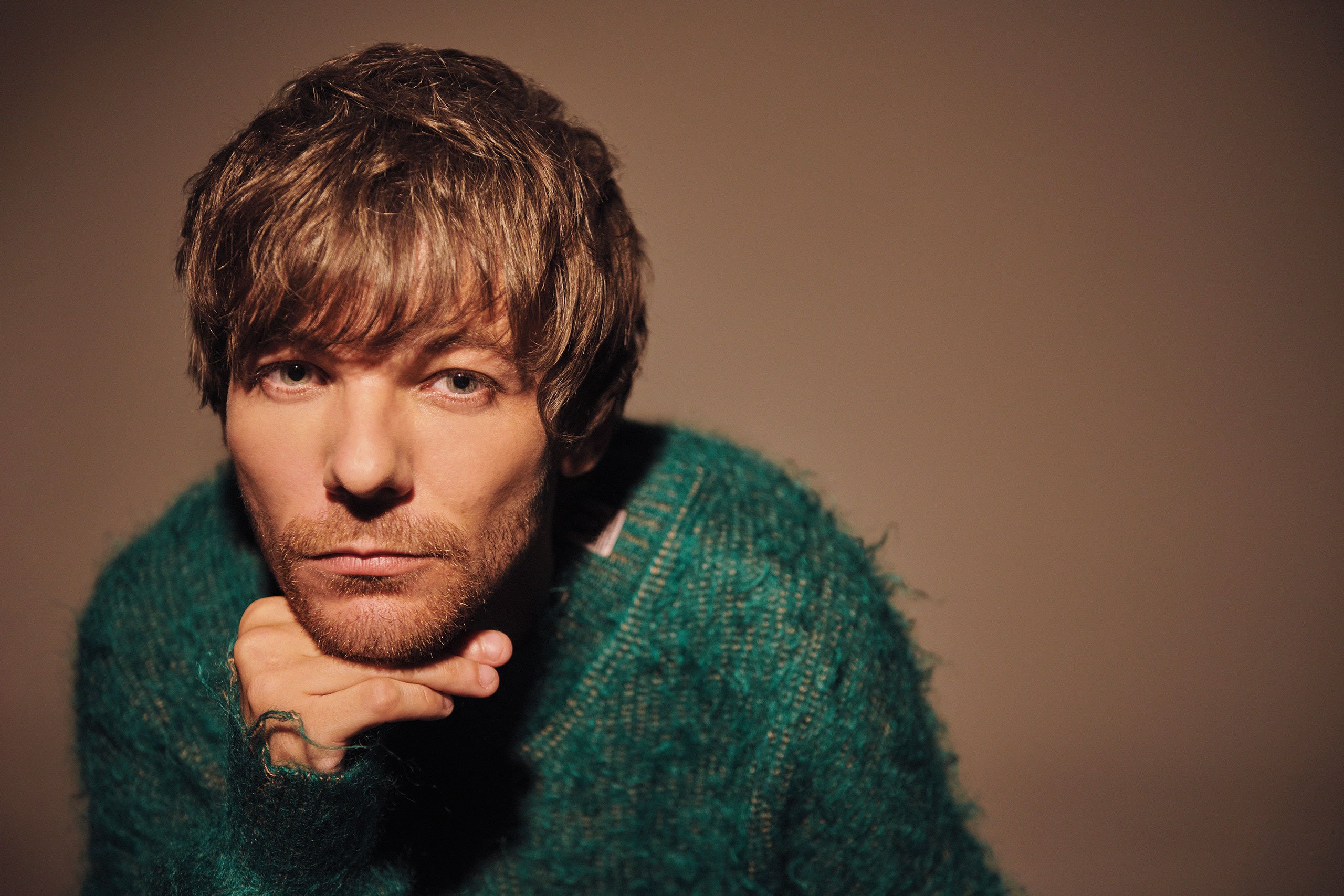 Louis Tomlinson is dropping his next single 'Out Of My System' this ...