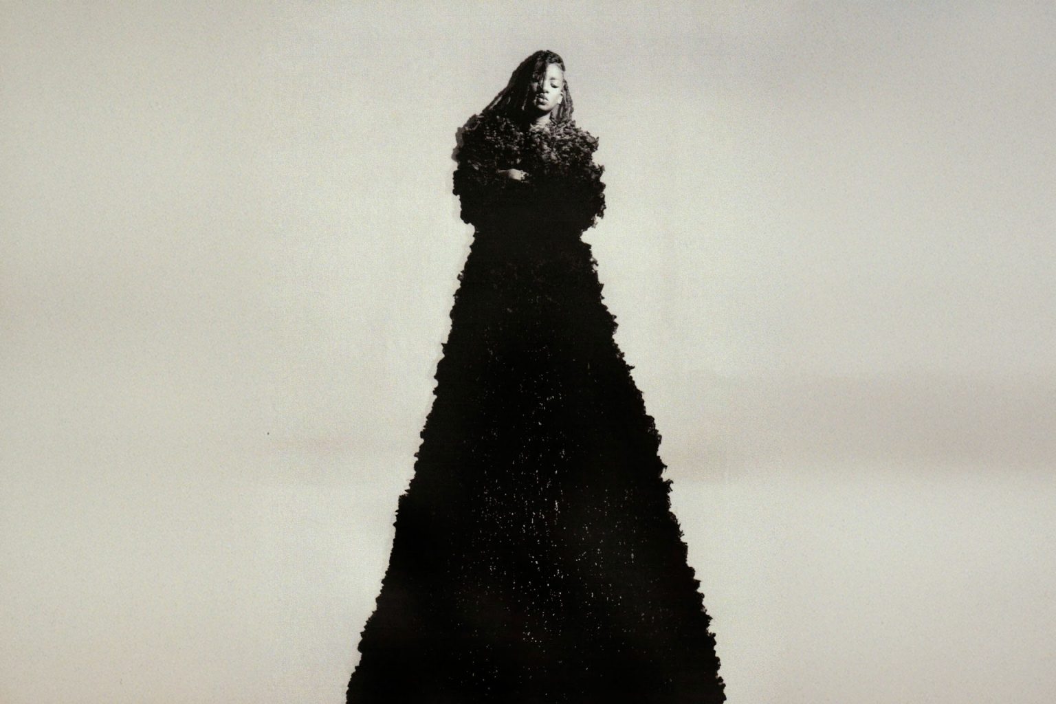 Little Simz has teased a new song 'Flood' with a stormy black-and-white ...